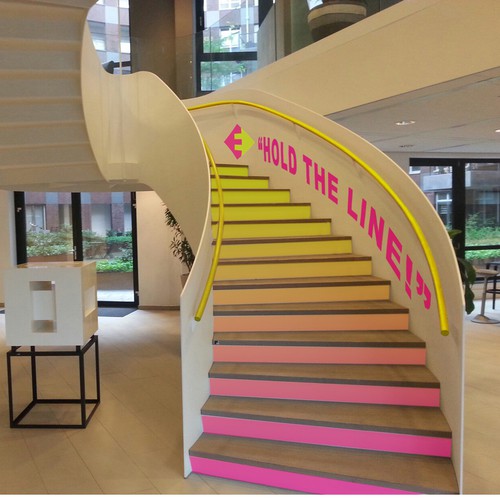 Inspire and challenge office employees to safely hold handrails while ...