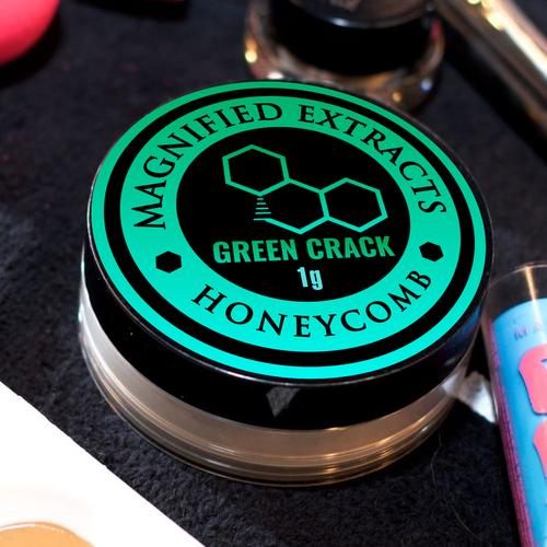 Create a bold, interesting logo for Magnified Extracts, a growing ...